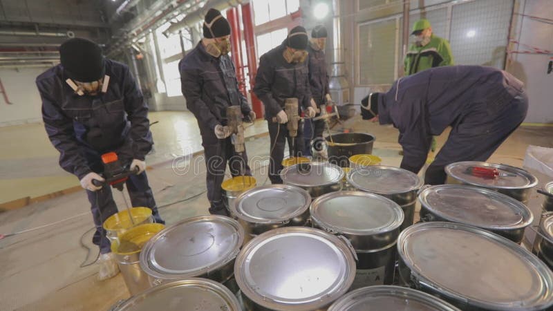 Workers at a Construction Site. Working Process at a Construction Site ...