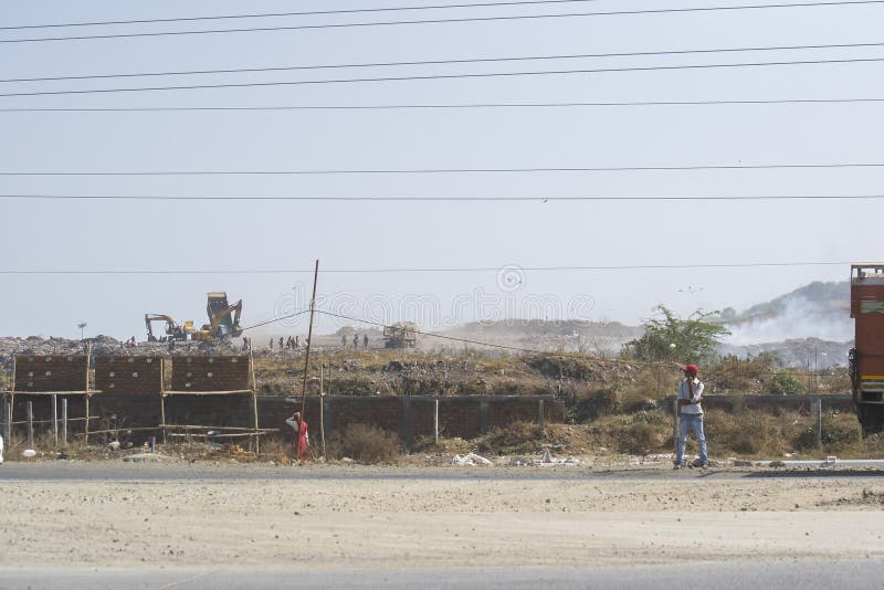 Workers at Construction with Trenching Ground in Background Stock Photo ...