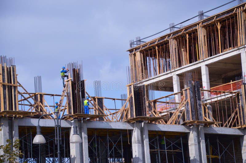 Workers on constructions editorial stock photo. Image of house - 45054828