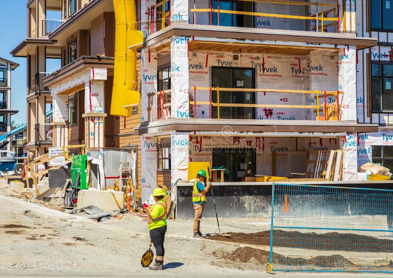 Workers on Constuction Site Working Together Teamwork Concept. People ...