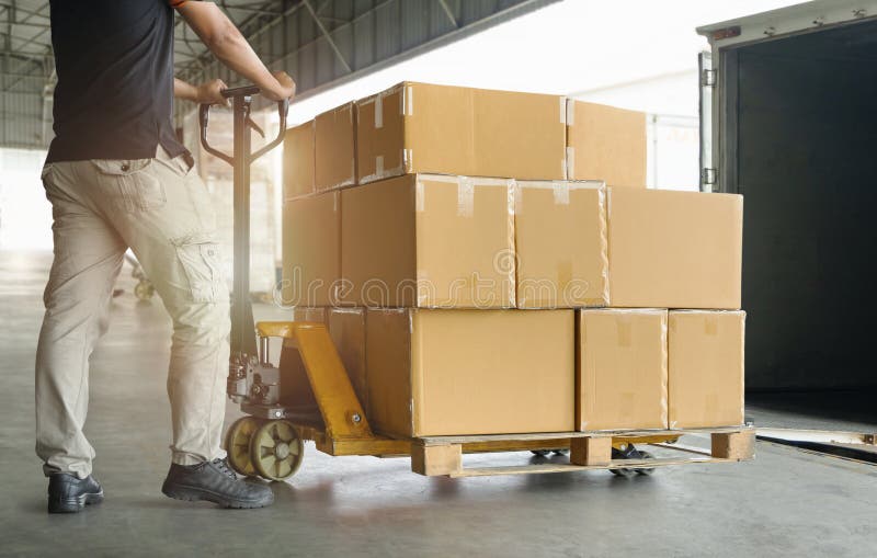 Workers Courier Unloading Packaging Boxes on Pallet into Cargo ...