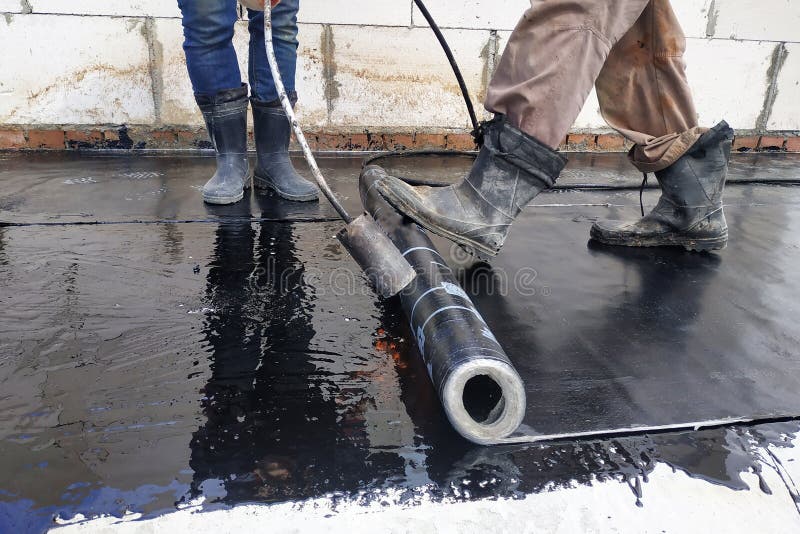 Workers Cover the Concrete Screed with Mortar and Make Waterproofing ...