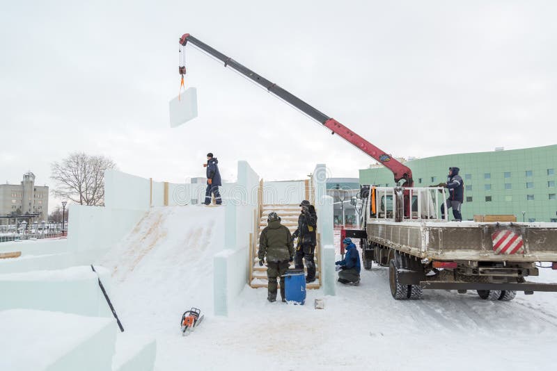 Workers Assemble Ice Blocks on the Frame of a Wooden Slide Stock Image ...