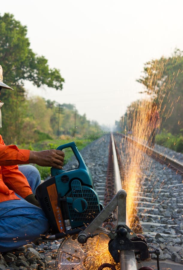 Workers Cutting Tracks for Maintenance. Stock Image - Image of ...