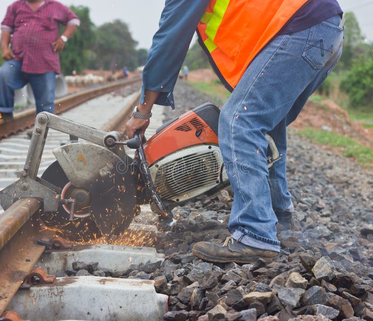 Workers Cutting Tracks for Maintenance. Stock Image - Image of ...