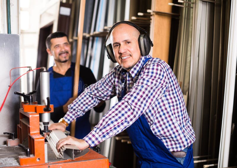Workers Cutting Window Profiles Stock Image - Image of brigade ...