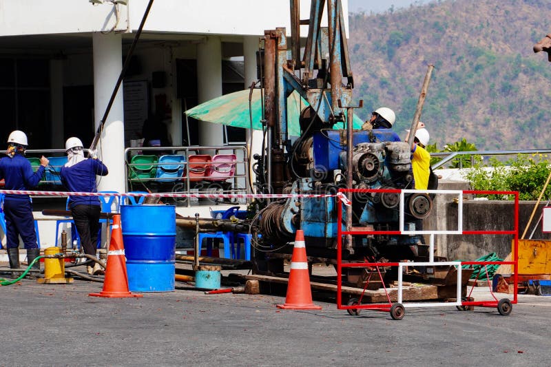 Workers are Digging Drilling of the Earth for Pipe Replacement, Sewer ...