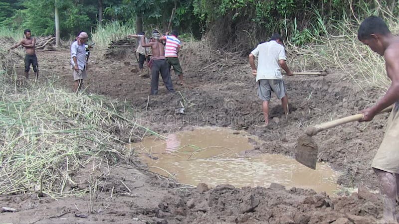 Workers Digging a Trench To Make a Rural Path Stock Video - Video of ...