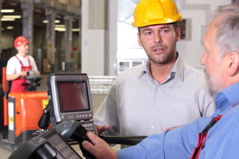 Workers discussing stock photo. Image of discussing, machinery - 5684772