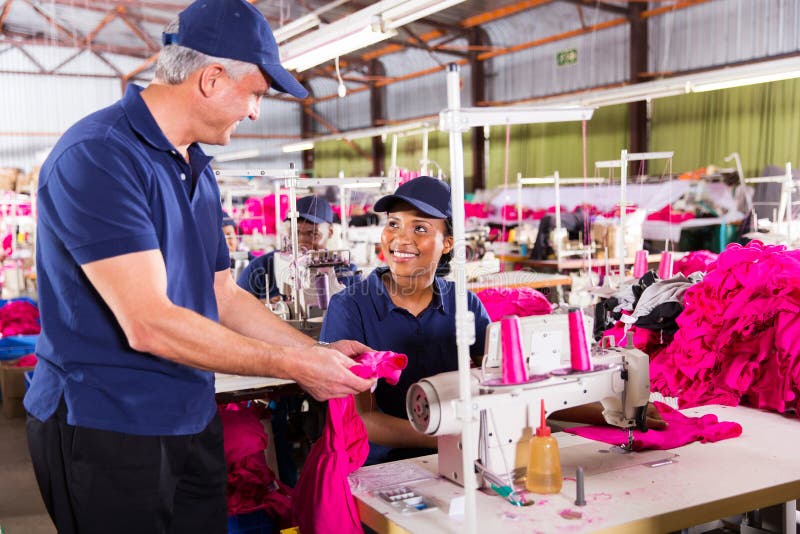 Two textile workers stock photo. Image of cloth, plant - 27311106