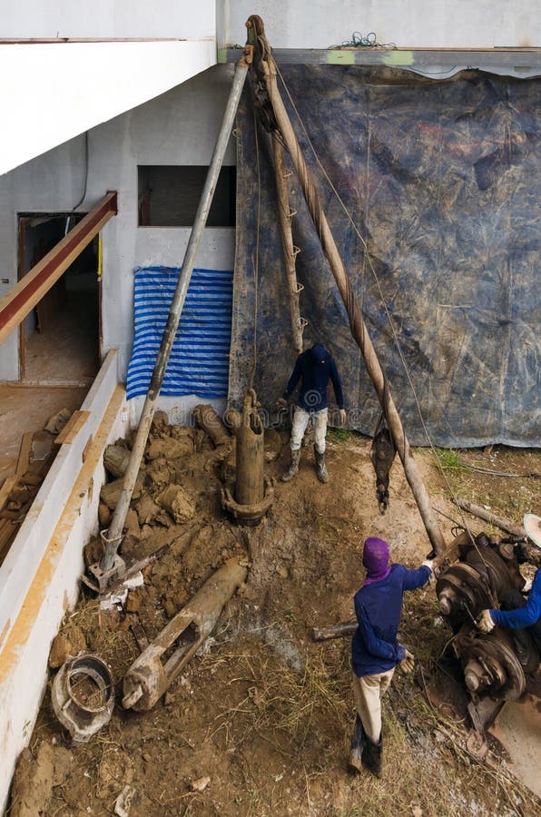 Workers Drilling for a Foundation Pile Stock Photo - Image of labor ...