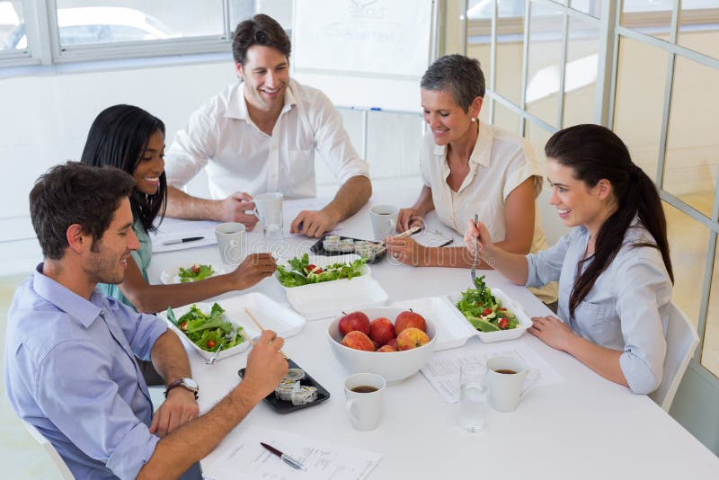 Workers Eating Fruit and Salad Together for Lunch Stock Image - Image ...