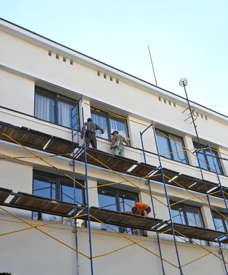 Workers Engaged in Building Maintenance Using Scaffolding Editorial Stock Image - Image of ...