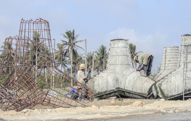 Construction of Wave Breaker Structure with Workers Engaged at Glagah ...