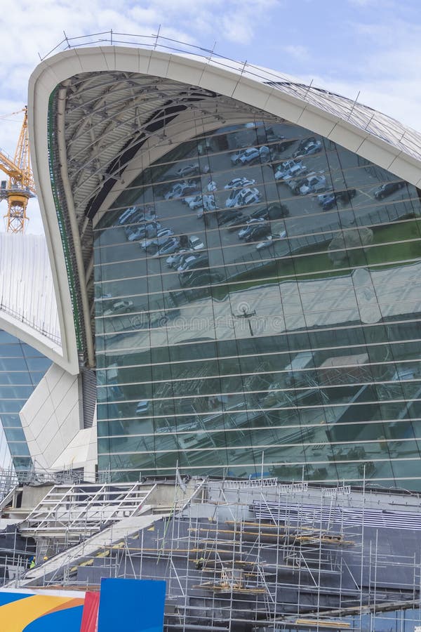 Workers are Engaged in the Installation of the Roof on a High-rise ...