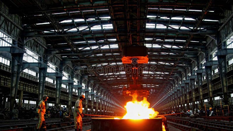 Steel Melting Process at a Large Industrial Facility in the Evening ...