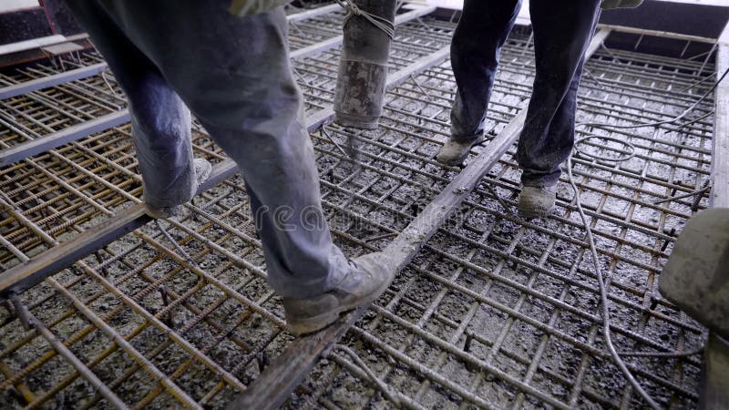 Workers and Engineers Pour Foundation. Tons of Concrete and ...