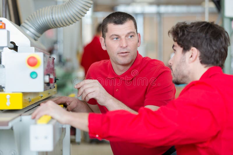 Workers in Factory Machine beside Stock Image - Image of ward, setting ...