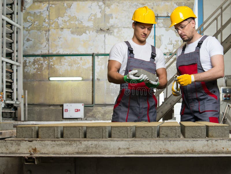 Workers on a factory stock photo. Image of construction - 40594316