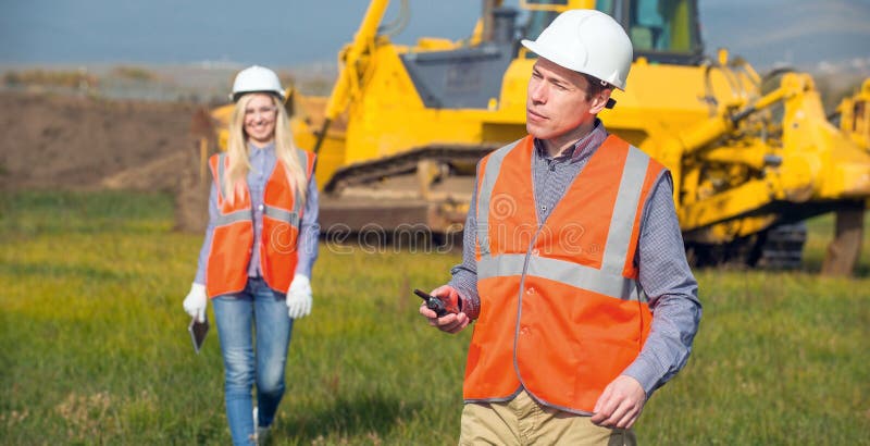 Workers in the field stock photo. Image of helmet, employment - 78201518