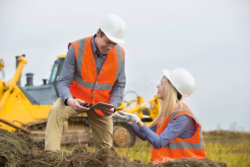 Workers in the field stock photo. Image of contractor - 78233264