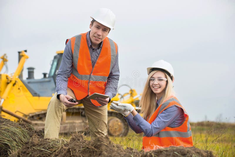 Workers in the field stock photo. Image of industry, couple - 78233300