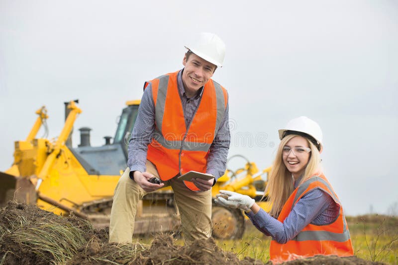 Workers in the field stock image. Image of foreman, holding - 78233331