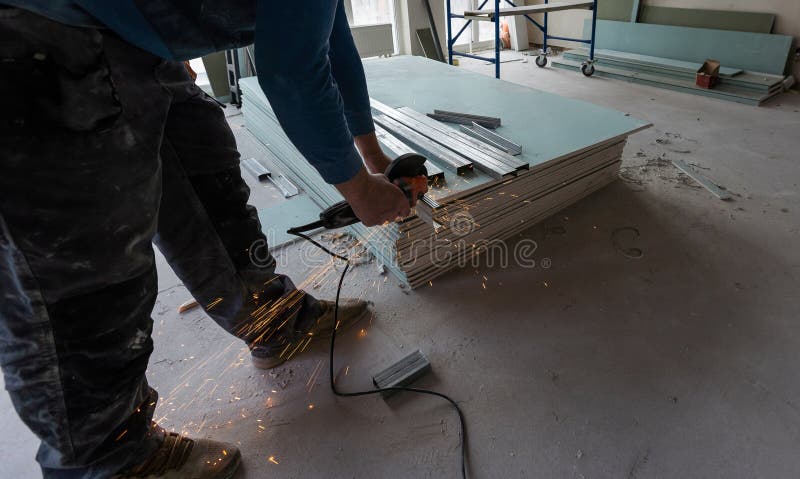 Workers Fitting Panel into Frame of Ceiling. Stock Photo - Image of ...