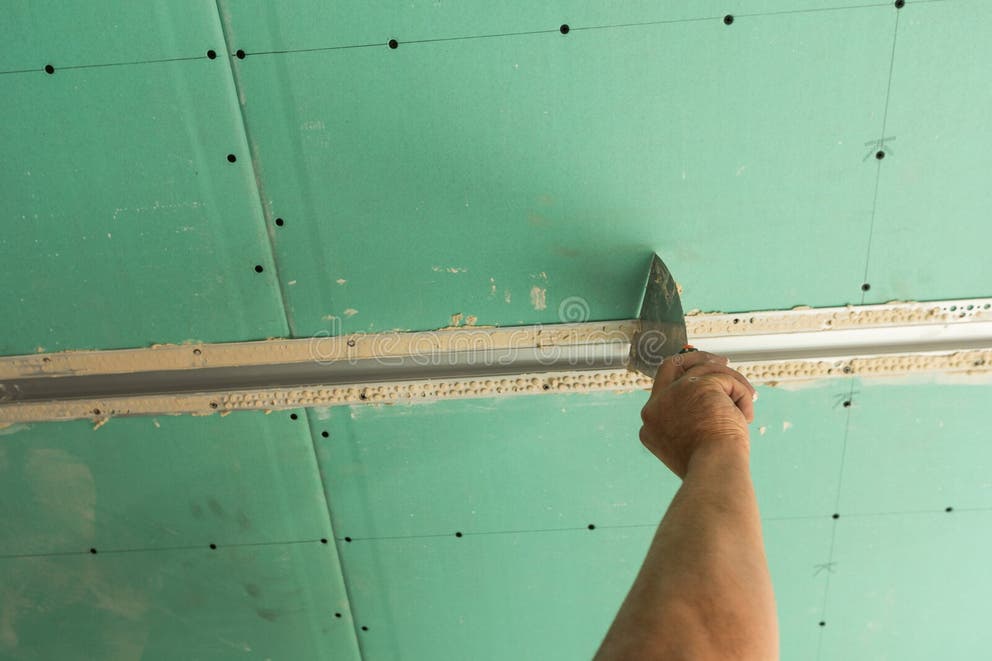 Workers Fitting Panel into Frame of Ceiling. Stock Image - Image of ...