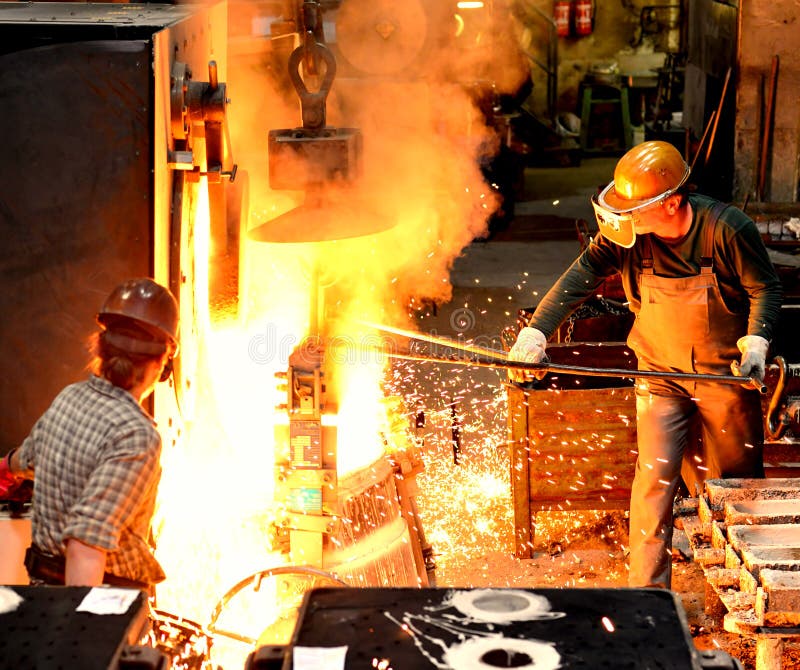 Workers in a Foundry Casting a Metal Workpiece - Safety at Work and ...