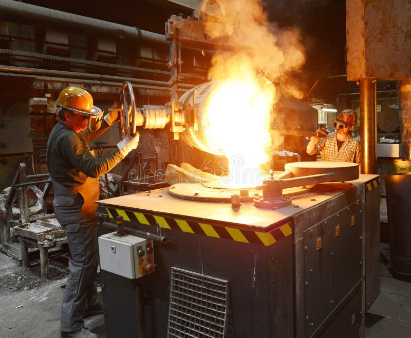 Workers in a Foundry Casting a Metal Workpiece - Safety at Work and ...