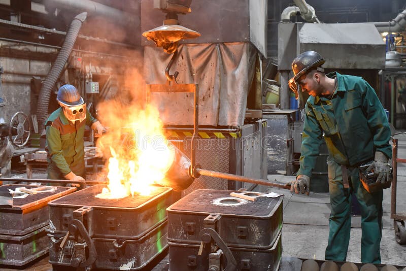 Workers in a Foundry Casting a Metal Workpiece - Safety at Work and ...