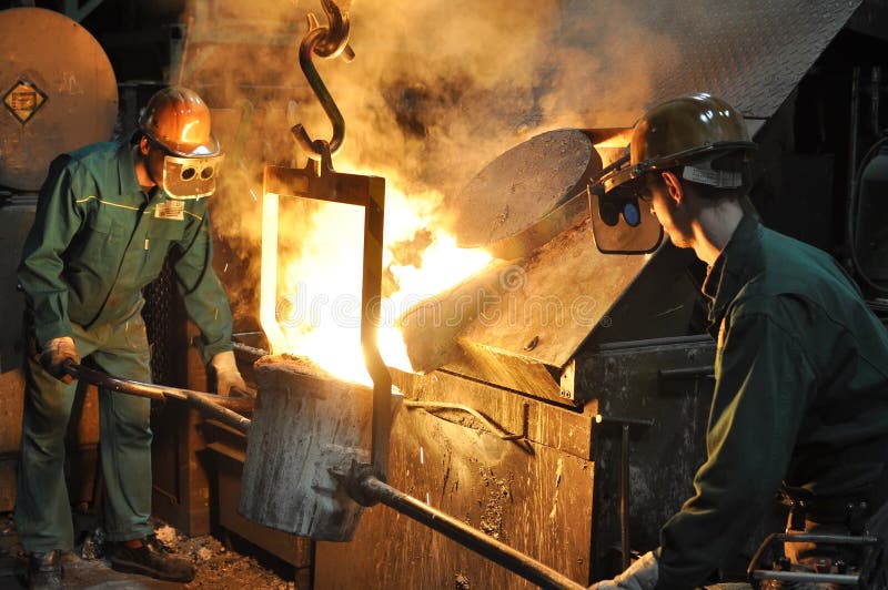 Workers in a Foundry Casting a Metal Workpiece - Safety at Work and ...