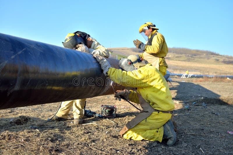 Workers on gas pipeline editorial stock image. Image of energy - 36381659