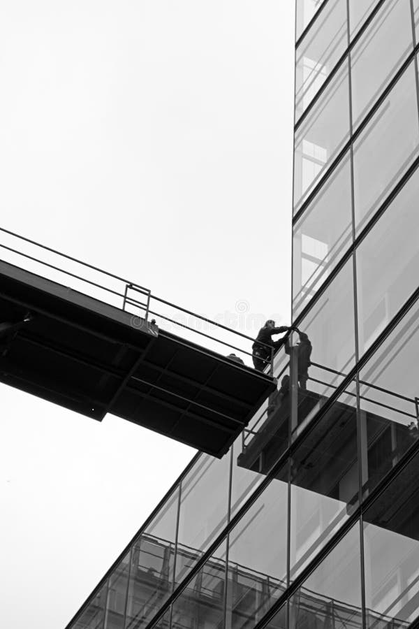 Workers at the Glass Storefront Stock Photo - Image of height, ramp ...