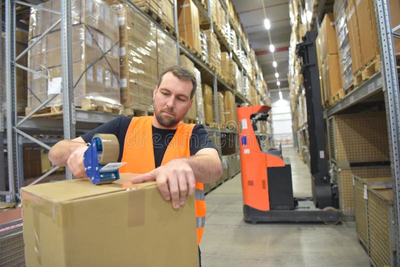 Workers in a Goods Warehouse in the Retail Trade Packaged a Package ...