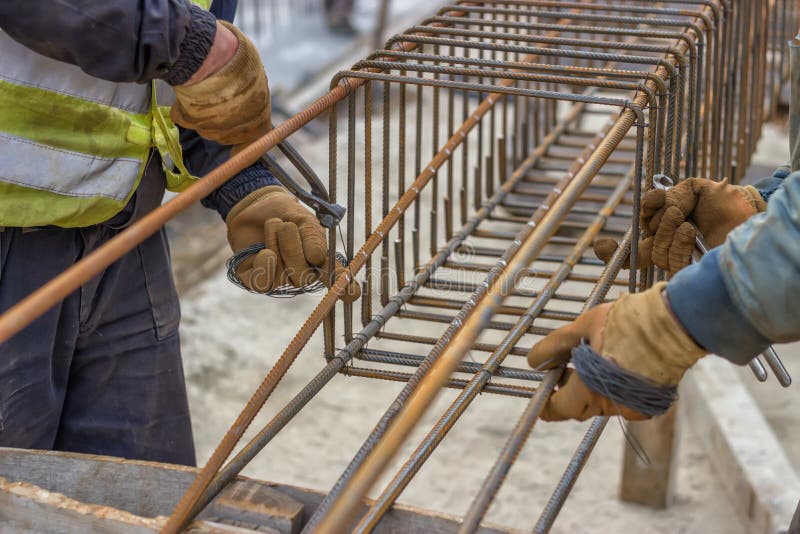 Workers Hands Fixing Steel Reinforcement Bars Stock Photo - Image: 41260836