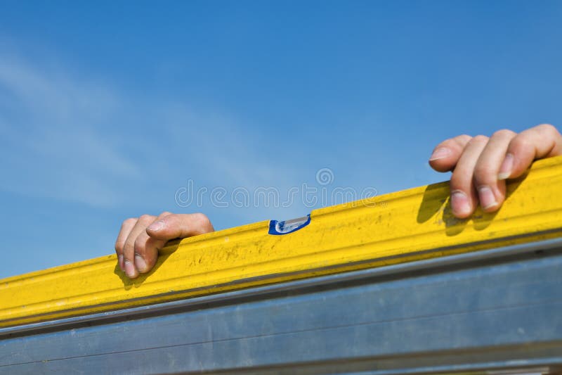 Workers Hands while Measuring with Spirit Level Stock Photo - Image of ...