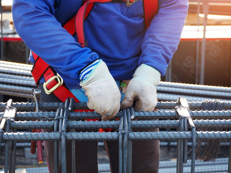 Workers Hands Using Steel Wire and Pincers To Secure Rebar Stock Photo ...