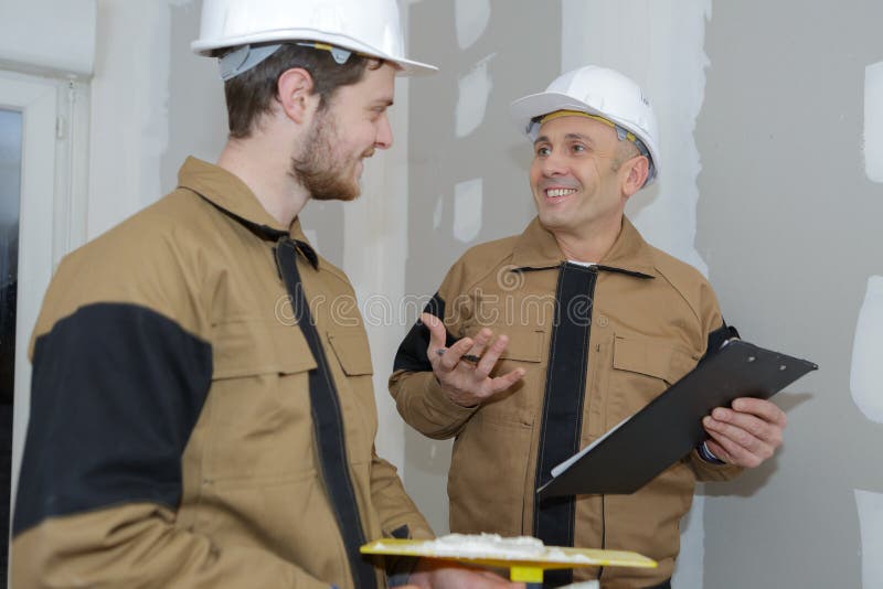 Workers having a talk stock photo. Image of communication - 118387670