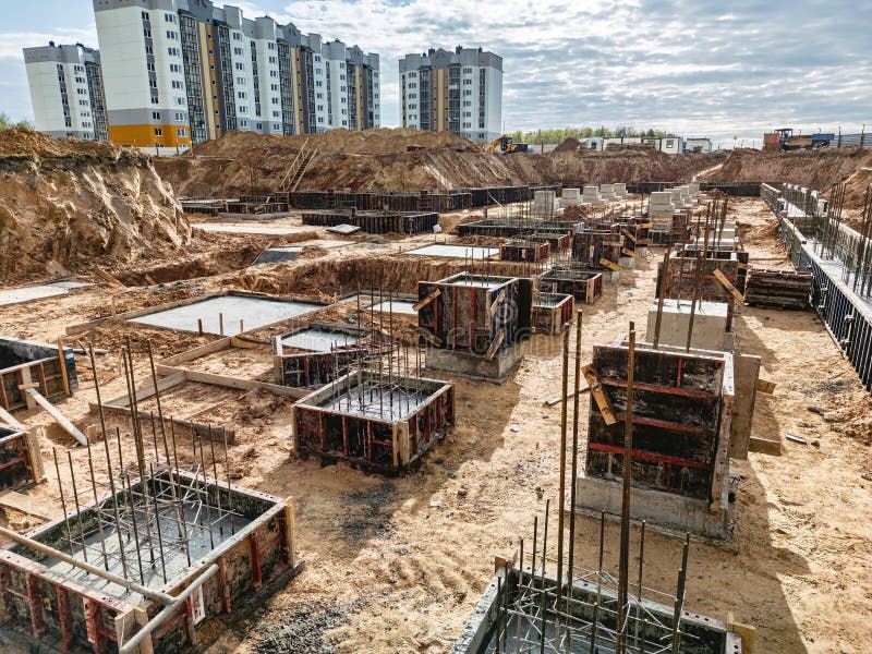 Construction Site in a Developing Neighborhood with Foundations Being ...