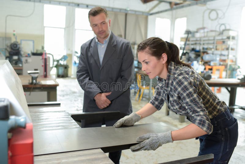 Workers Holding Metal Sheet in Workshop Stock Photo - Image of metal ...