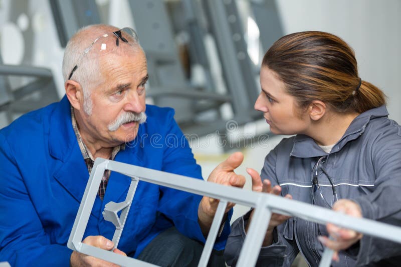 Workers holding frame stock image. Image of sign, door - 245447641