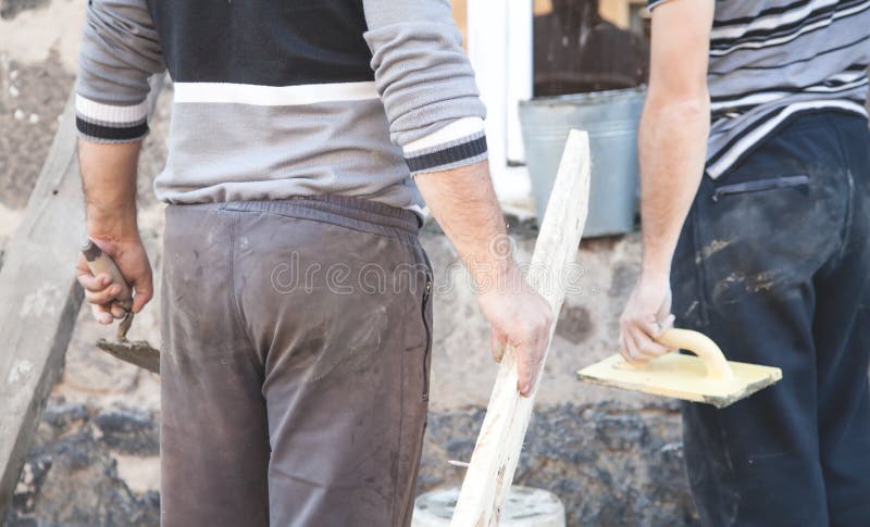 Workers Holding Tools. Plastering Wall Near Window Stock Image - Image ...