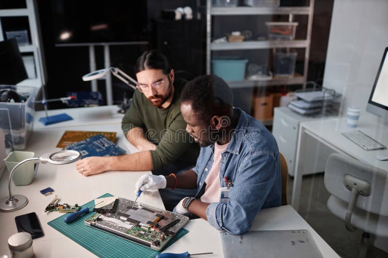Workers Inspecting Computer Stock Image - Image of industry, table ...