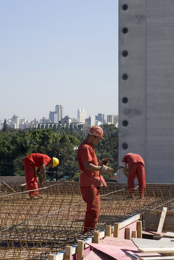 Workers Install Rebar - Vertical Stock Image - Image of outdoors ...