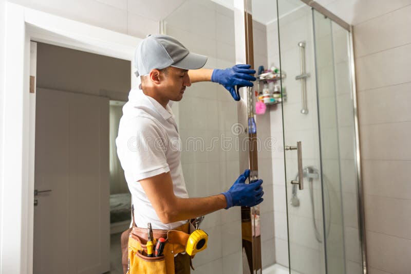 Workers are Installing Glass Door of the Shower Enclosure Stock Image ...