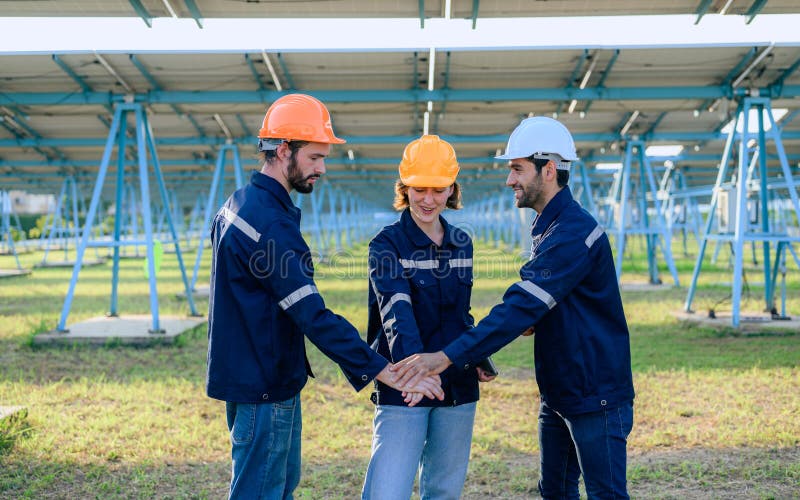 Workers Installing Solar Panels, Engineer Team at Solar Panel Farm ...