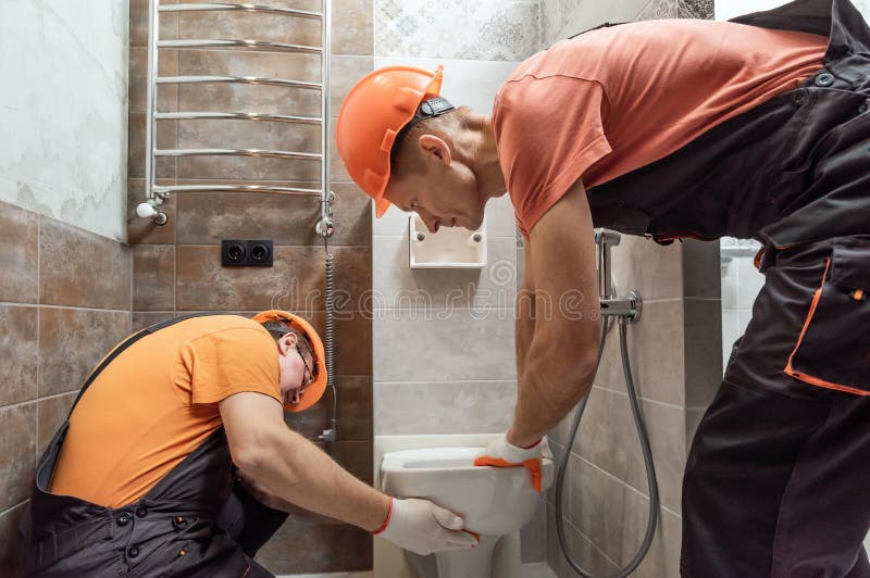 Workers are Installing a Toilet on the Wall Stock Image - Image of ...