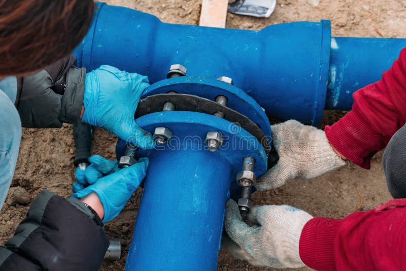 Workers Installing Water Supply Pipeline System, Close Up Stock Image ...